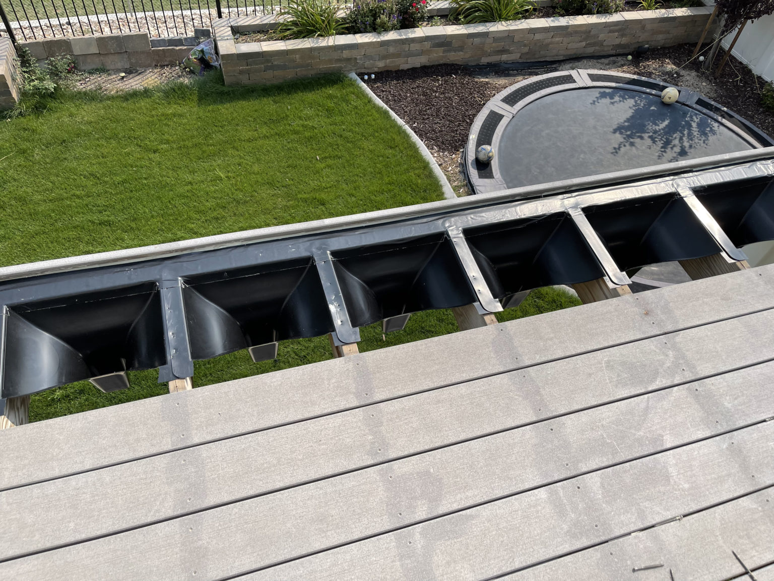 Adding a Drainage System to a Deck - Honeybear Lane